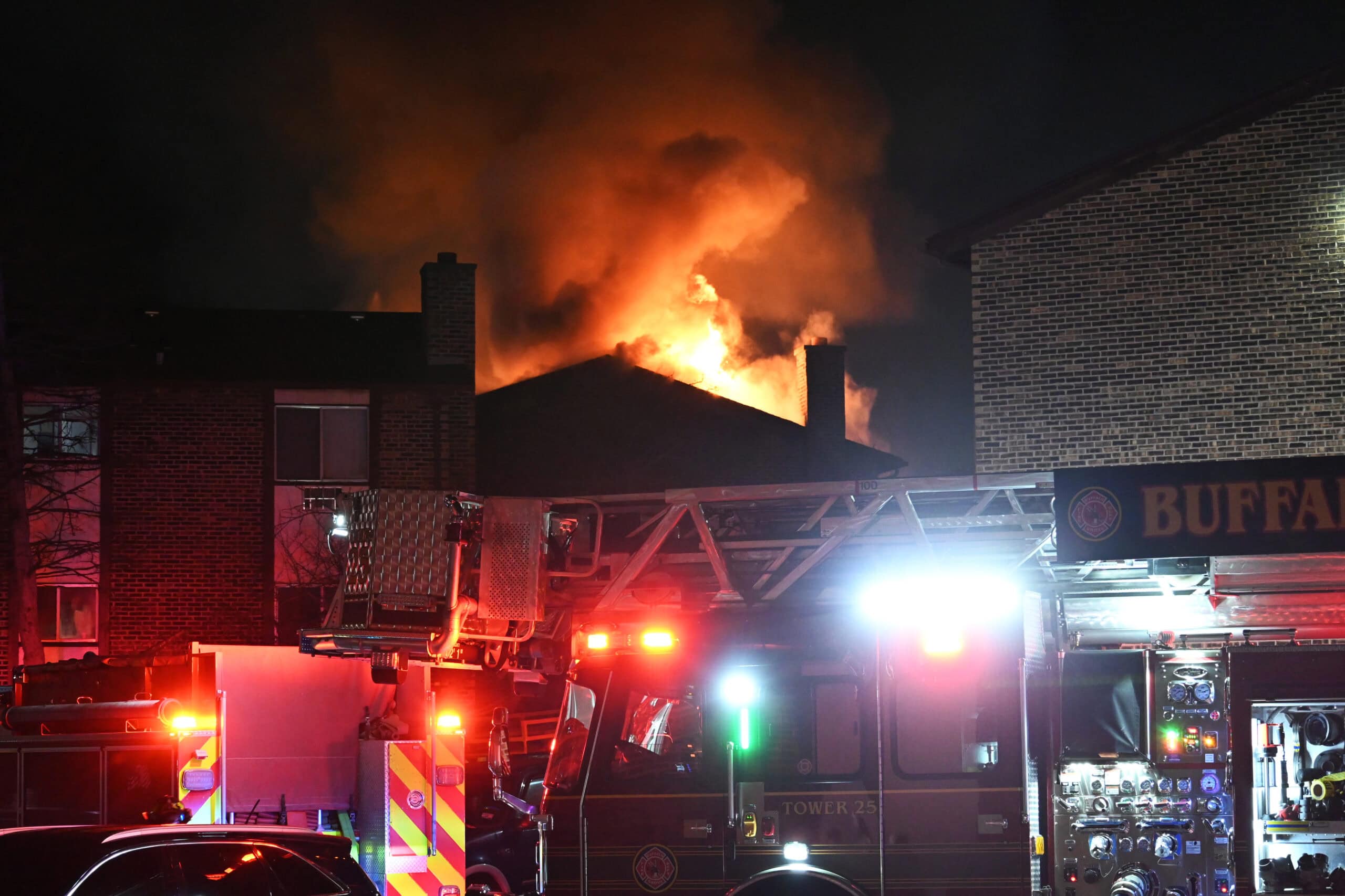 Resident says cooking caused extra-alarm fire that displaced over dozen ...